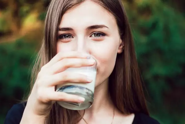 Girl Drinks Milk.